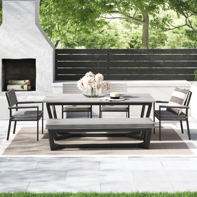 Abby Rectangular 6 Person 78.74 Long Dining Set with Cushions Cushion Color Navy Blue Gray